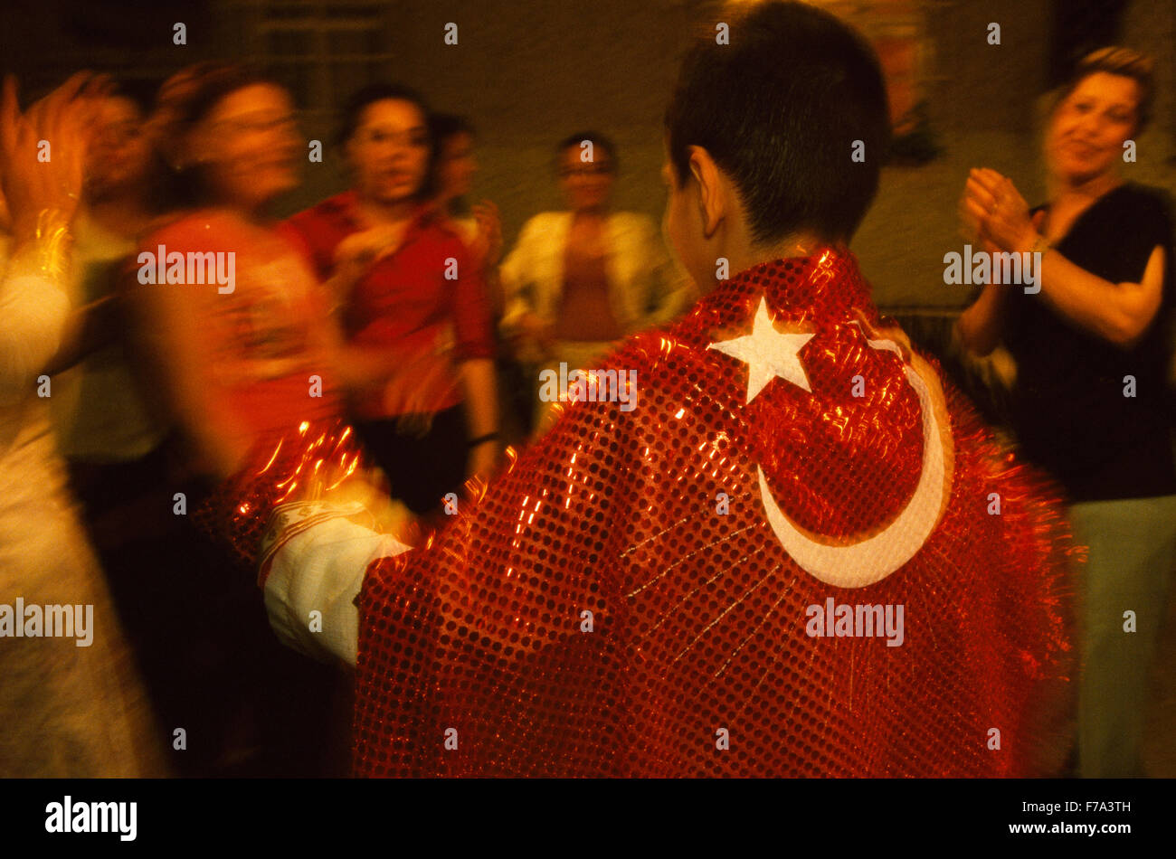 At the henna party of a newly circumcised boy in Istanbul, Turkey, he ...