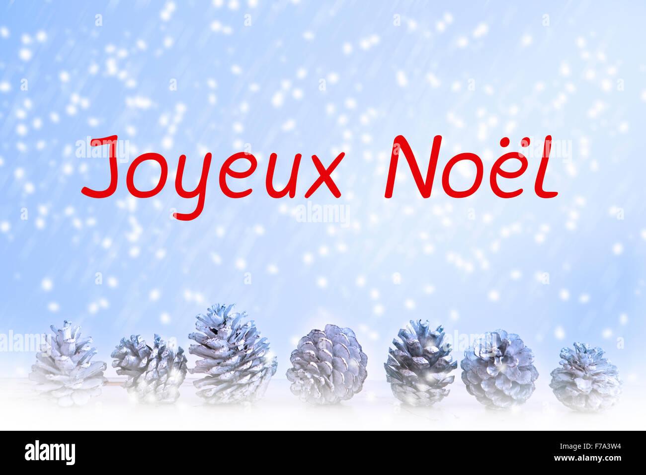 french 'Joyeux Noel' (merry christmas) written on blue background with ...