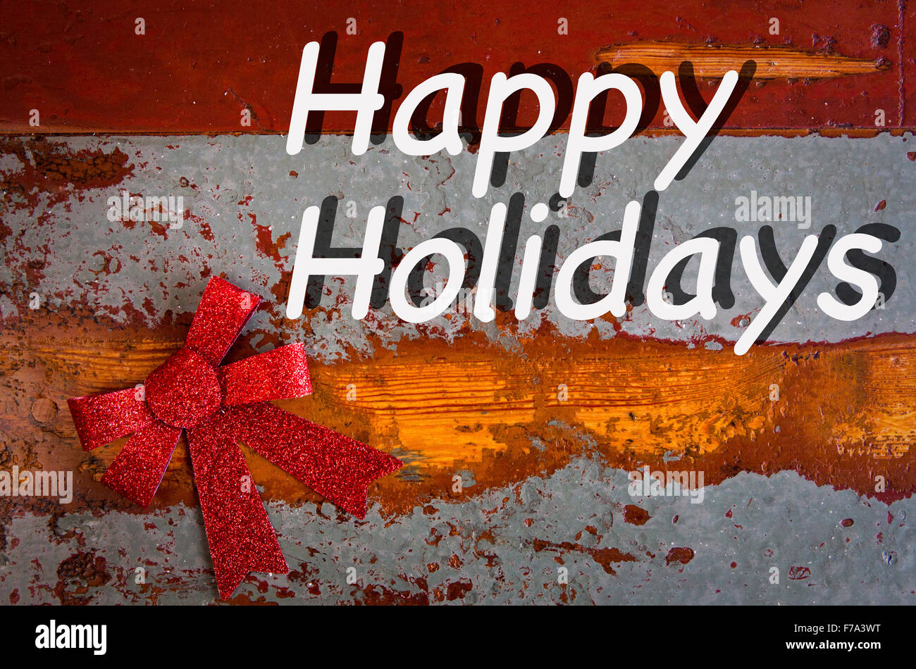 Happy holidays text on gift hi-res stock photography and images - Alamy