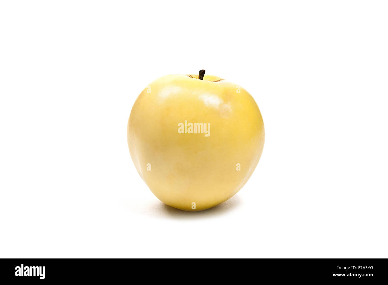 Single fresh yellow apple. Isolated on white background Stock Photo - Alamy