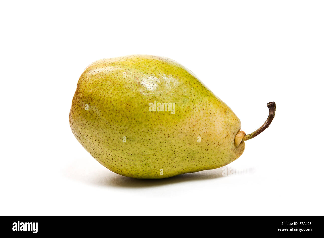 Single fresh green pear. Front view of conference pear isolated on ...