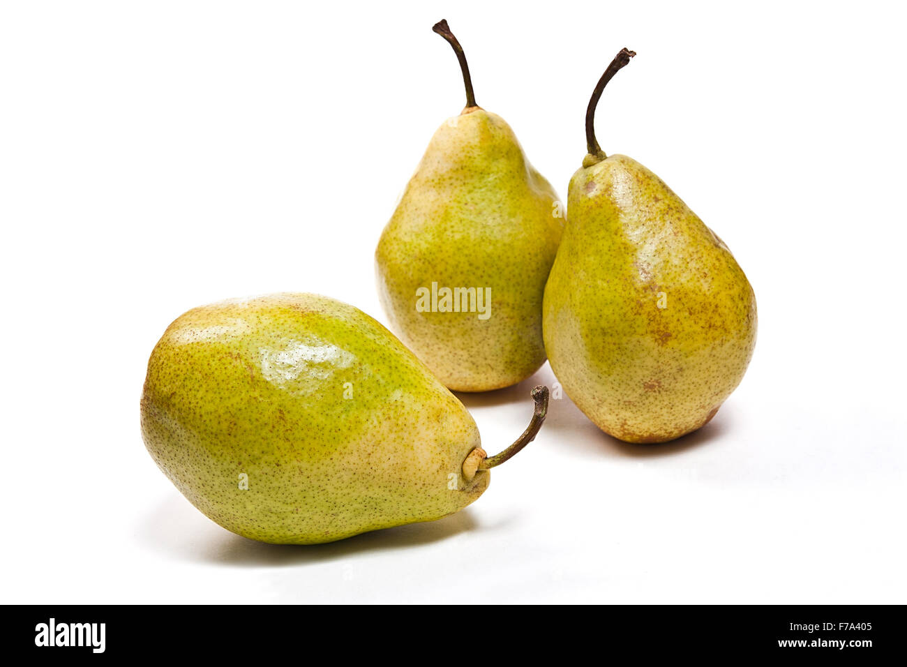 Three fresh green pears. Group of juicy ripe fruits. View of conference ...