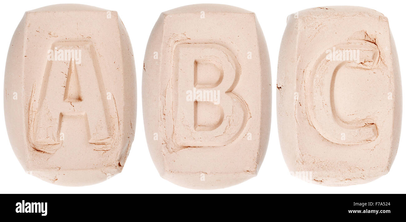 Handmade of white clay letters cutout on white background Stock Photo ...