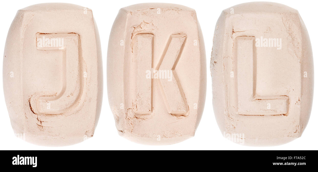 Handmade of white clay letters cutout on white background Stock Photo ...