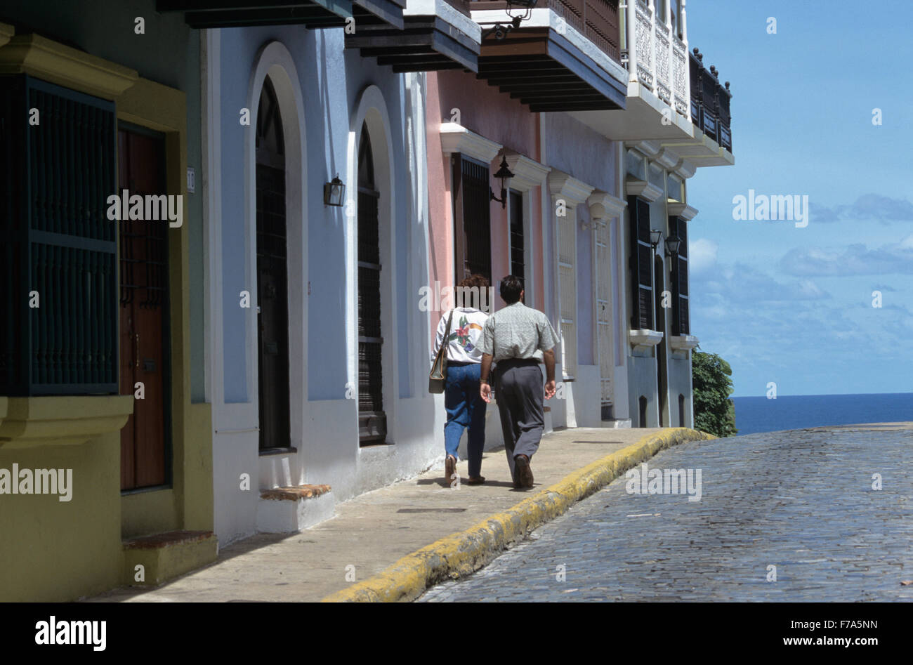 Street scene with a couple heading toward the ocean and horizon, Old ...