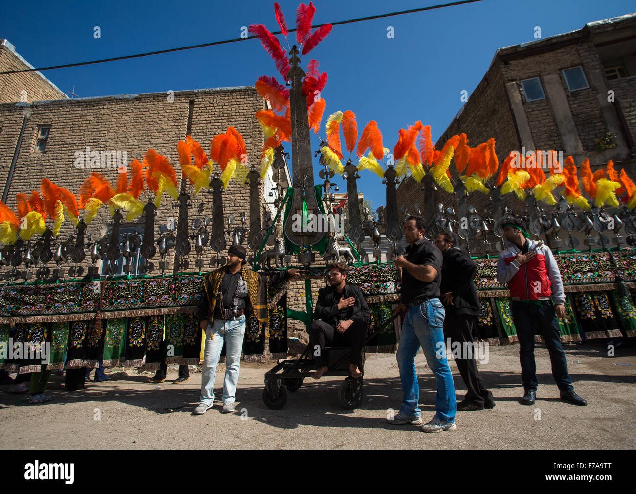 Iranian Shiite Muslims Men In Front Of An An Alam On Tasua Celebration ...