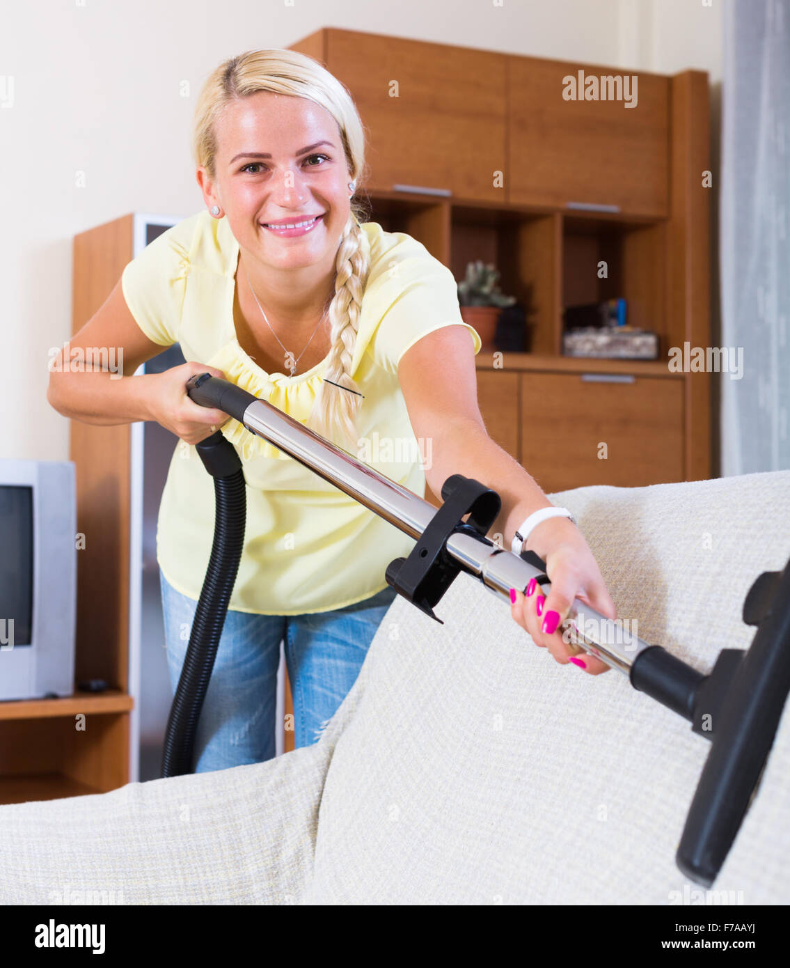 Using vacuum cleaner hi-res stock photography and images - Alamy