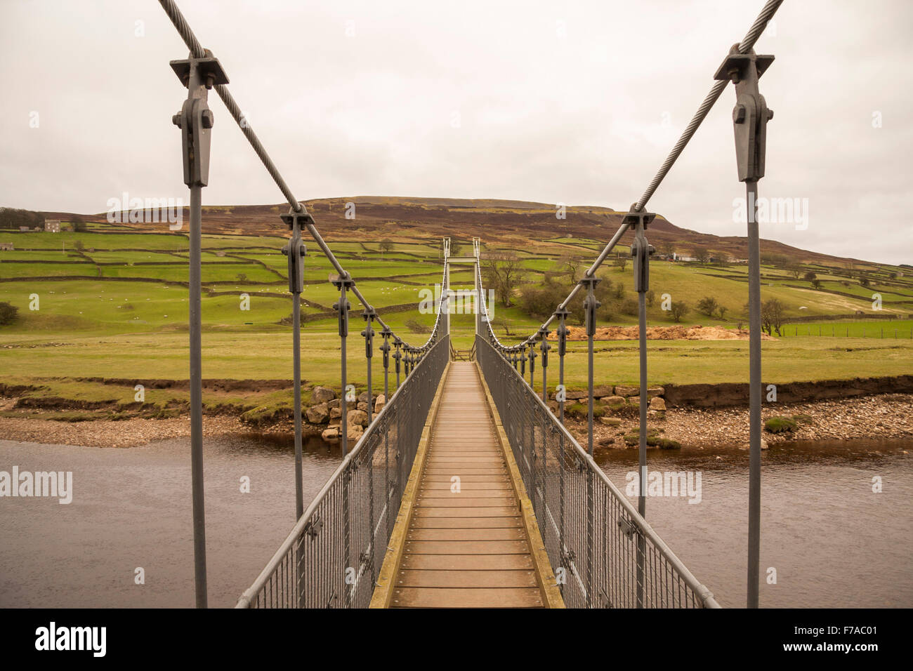 Footbridge over the River Swale at Reeth, North Yorkshire,England,UK ...