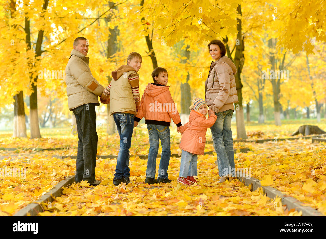 Portrait of family relaxing Stock Photo - Alamy