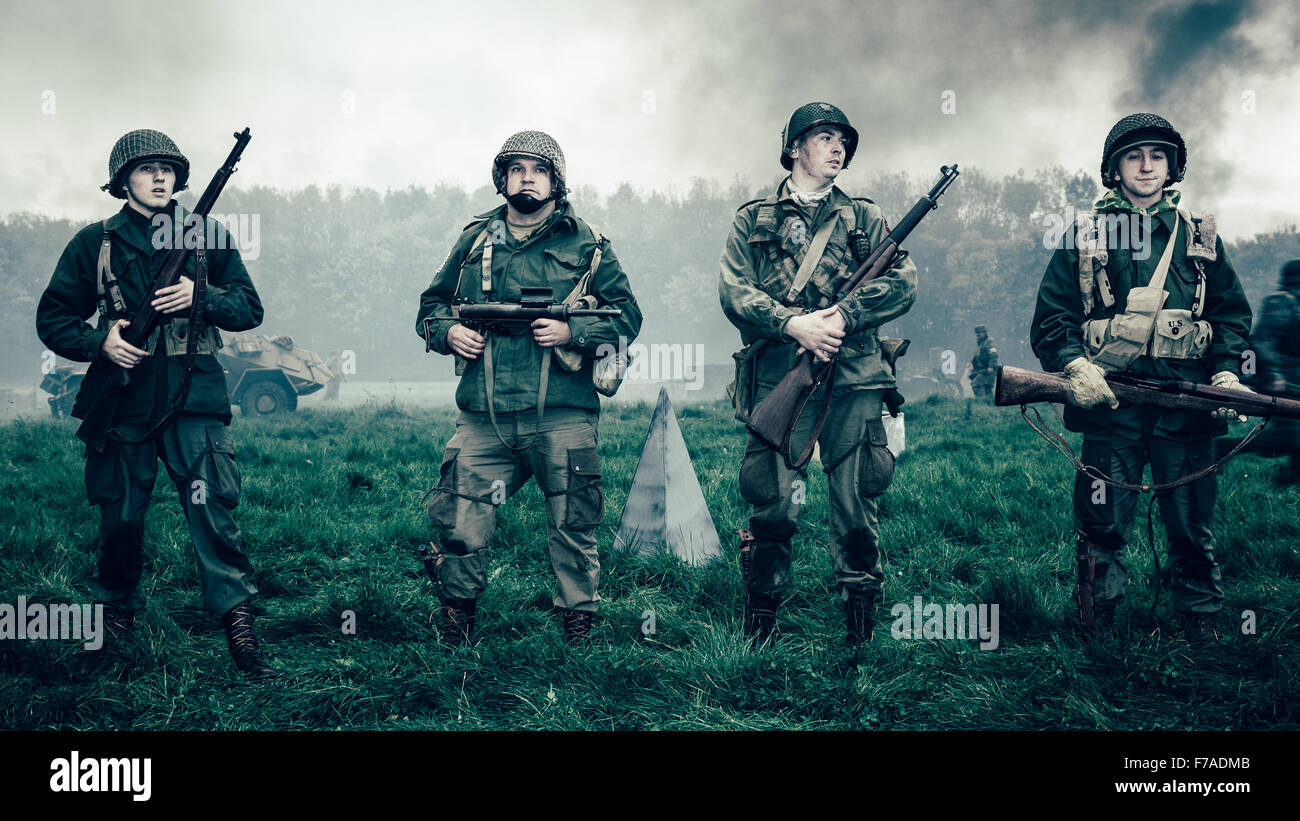 Four reenactment soldiers lined up on the battlefield with guns Stock ...