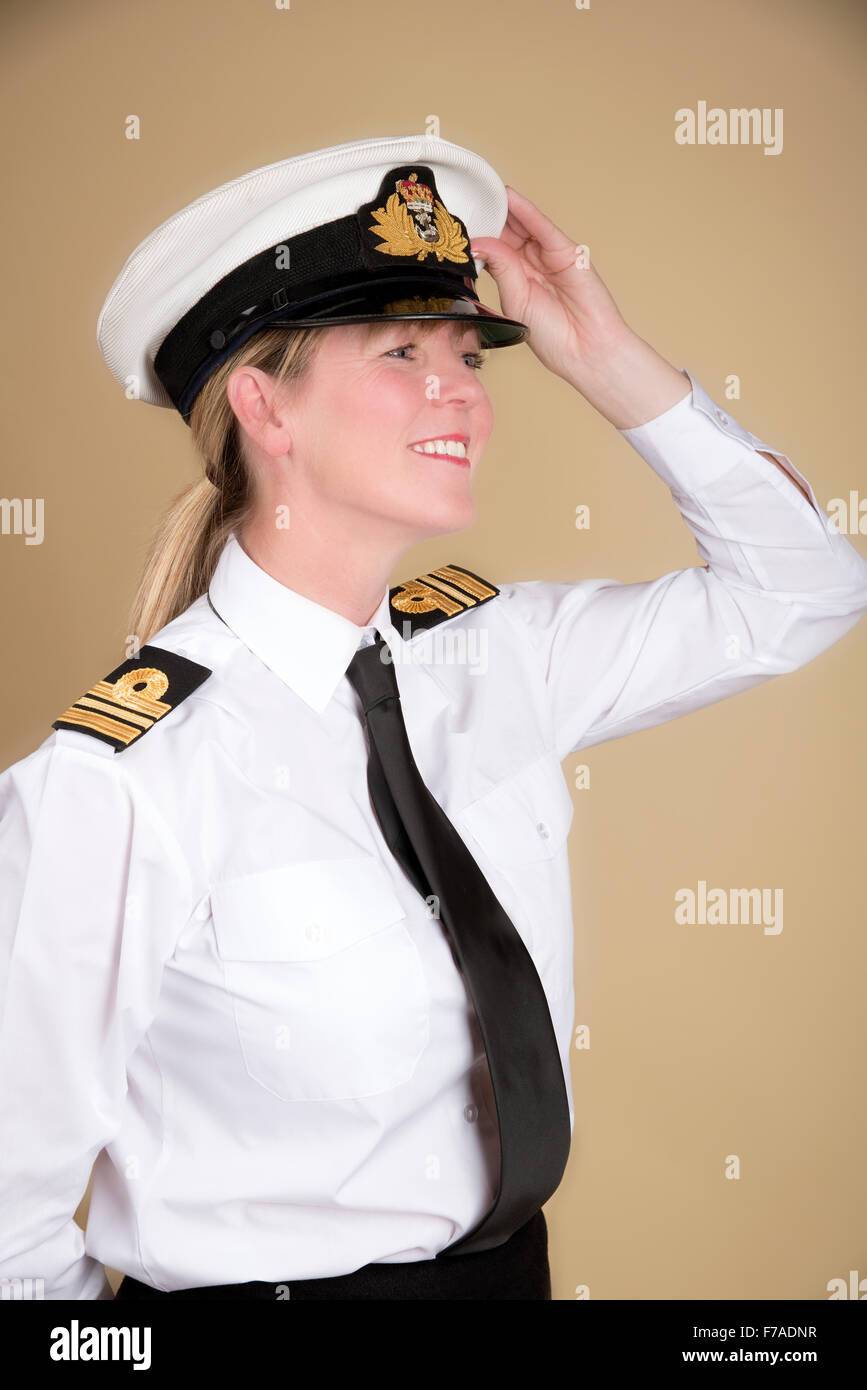 Portrait of a female senior rank of Lt Commander naval officer holding ...