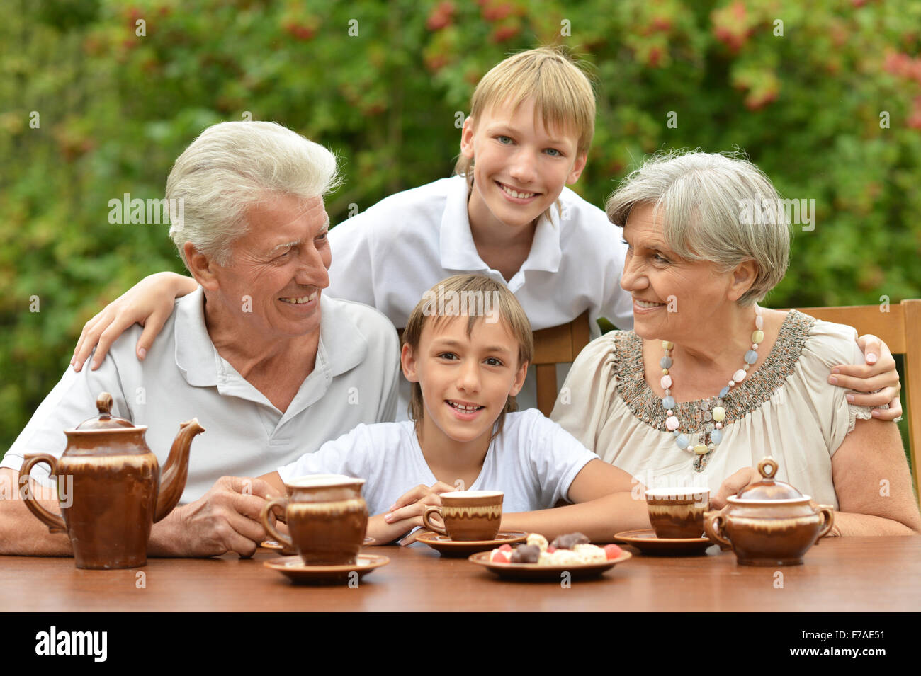 family drinking tea Stock Photo - Alamy
