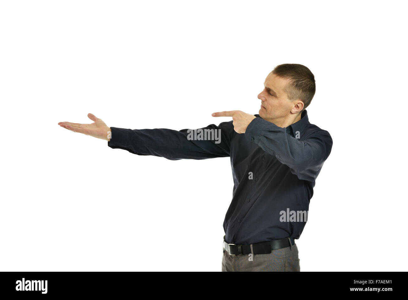 Attractive man pointing Stock Photo - Alamy