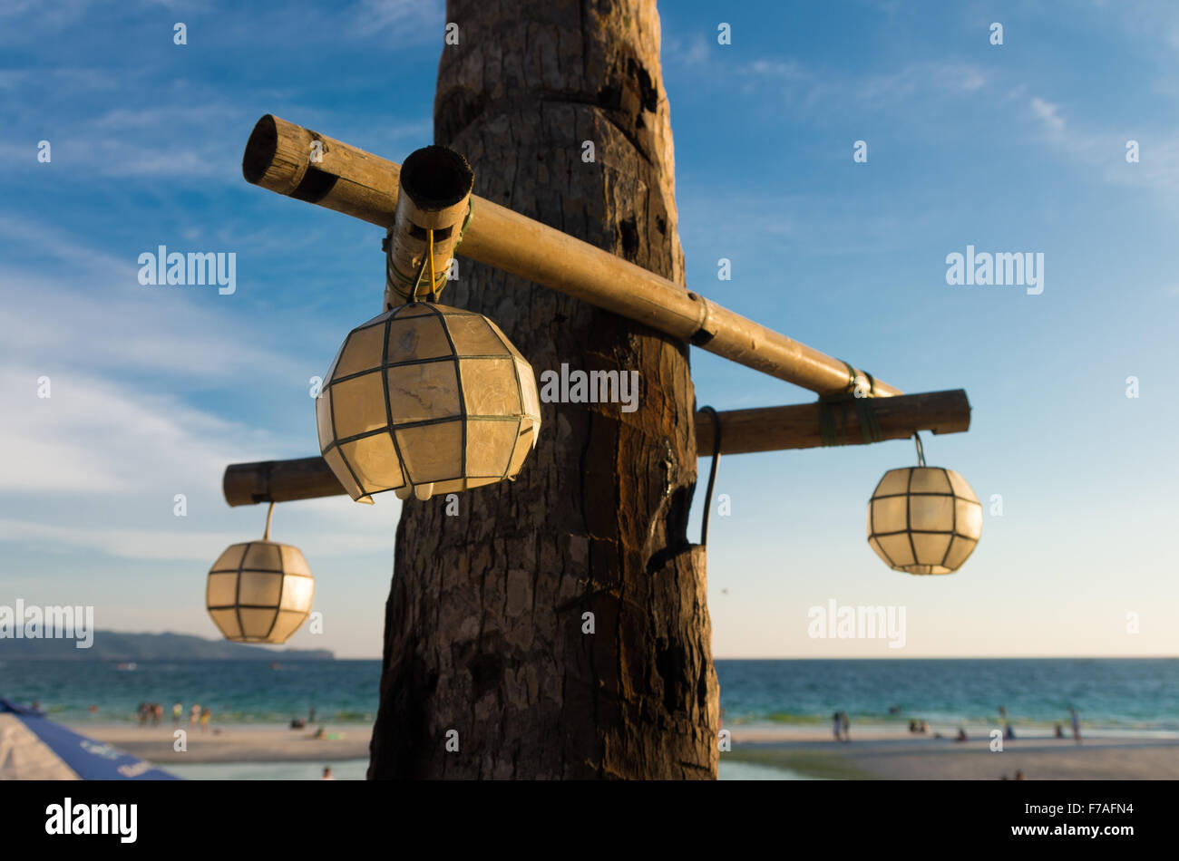 palm tree with lanterns on a tropical beach in the philippines Stock ...