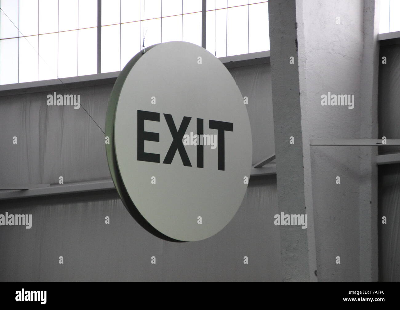 Round Exit Sign in Industrial Environment with Back light and Down ...
