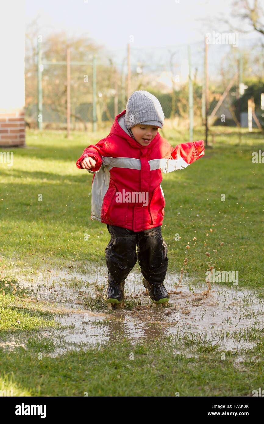 Children rain puddle hi-res stock photography and images - Alamy