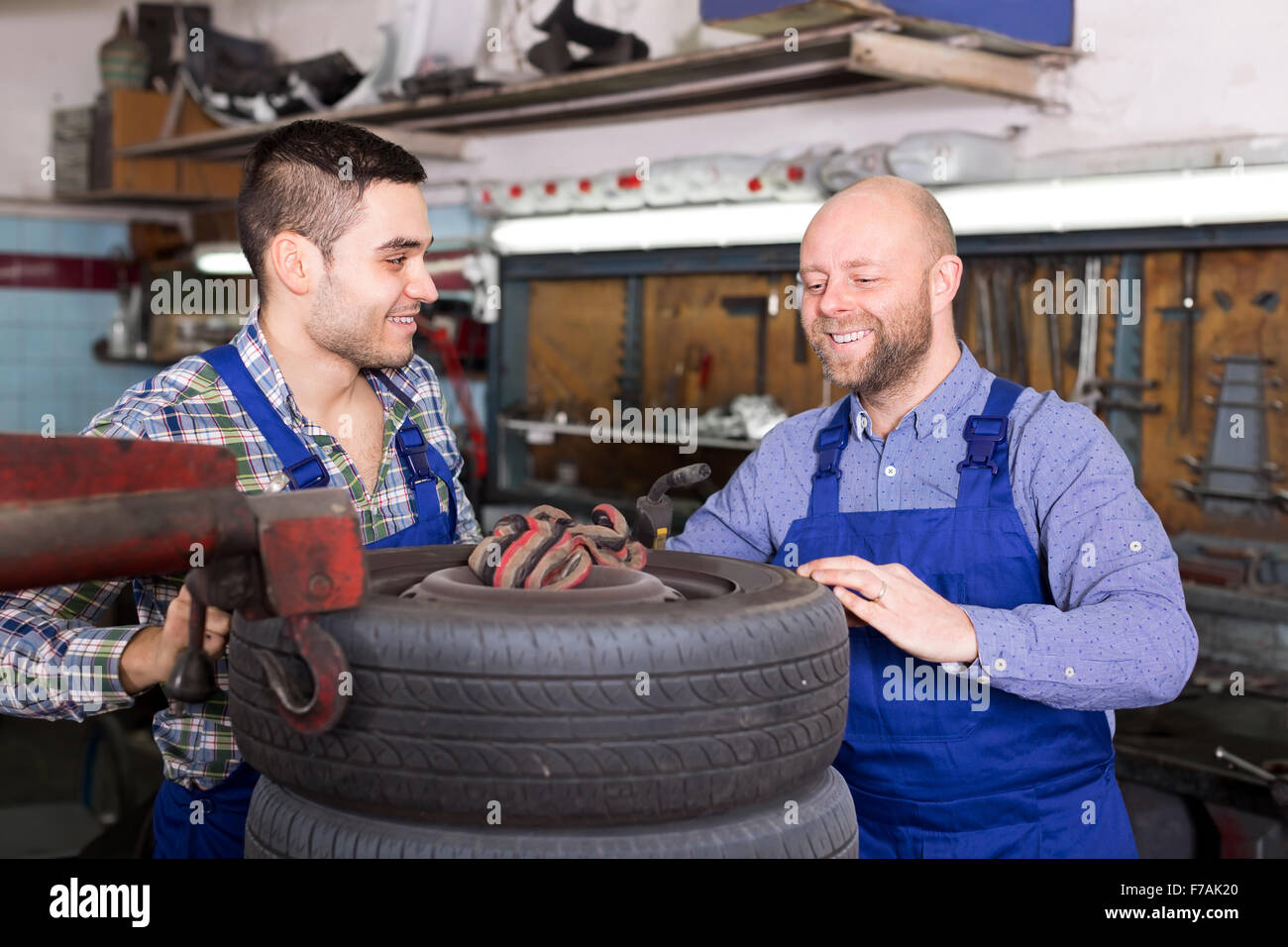 Mechanic working hard on car hi-res stock photography and images - Alamy