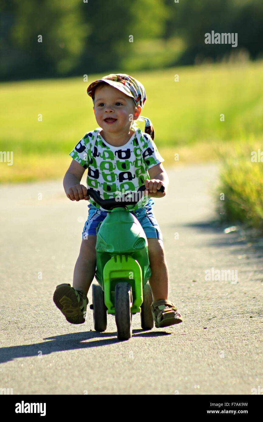 little boy on a bicycle Stock Photo - Alamy