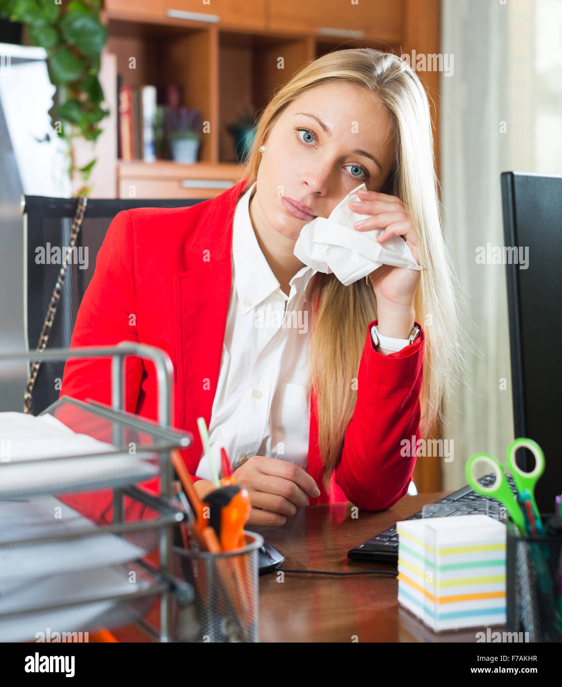 Sad girl sitting alone crying hi-res stock photography and images - Alamy