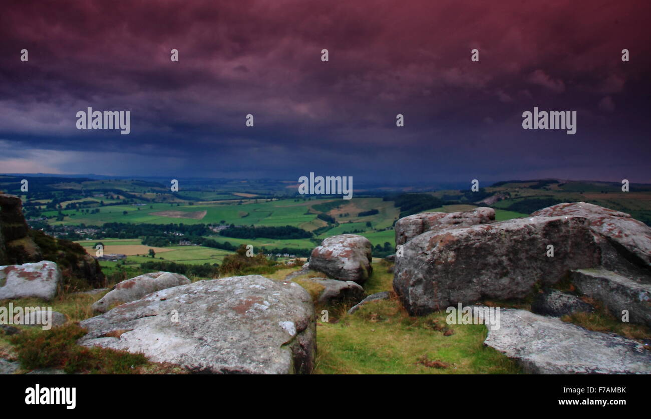 A storm rises over Baslow Edge in the Peak District National Park ...