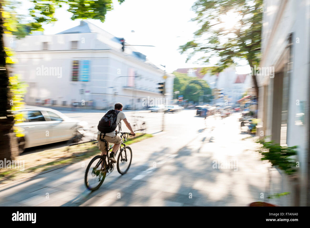 Woman driving bike street germany hi-res stock photography and images ...