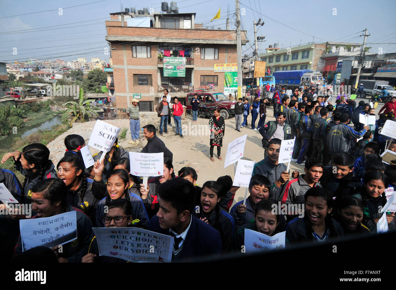 Nepalese students holds placards with different slogans as they take ...