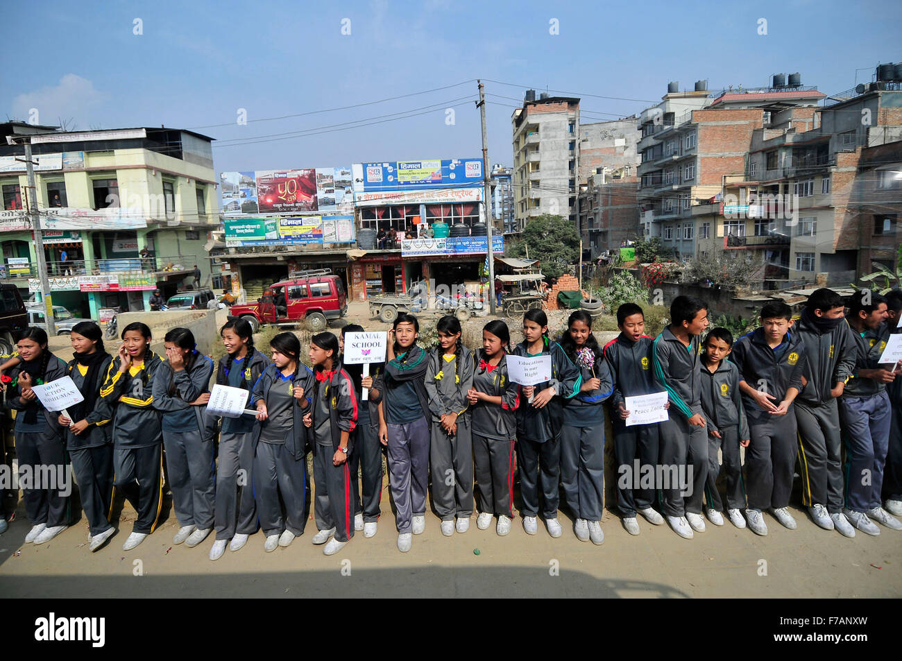 Nepalese students holds placards with different slogans as they take ...