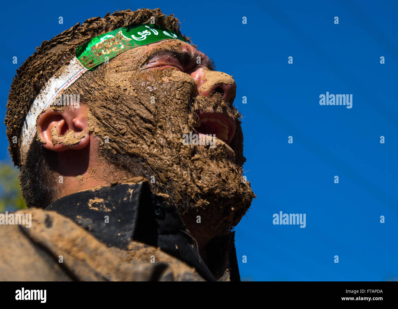 Iranian Shiite Muslim Man Covered In Mud Crying During Ashura Day ...