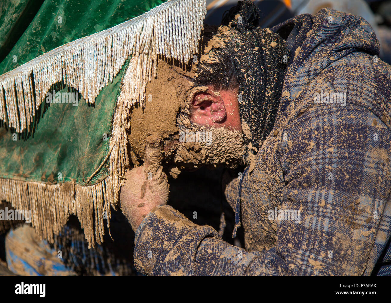 Iranian Shiite Muslim Man Covered In Mud Crying During Ashura Day ...