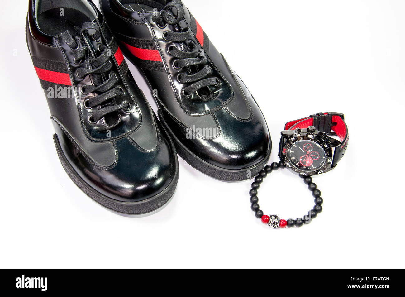 Black men shoes with red stripe, watch and bracelet isolated by white ...