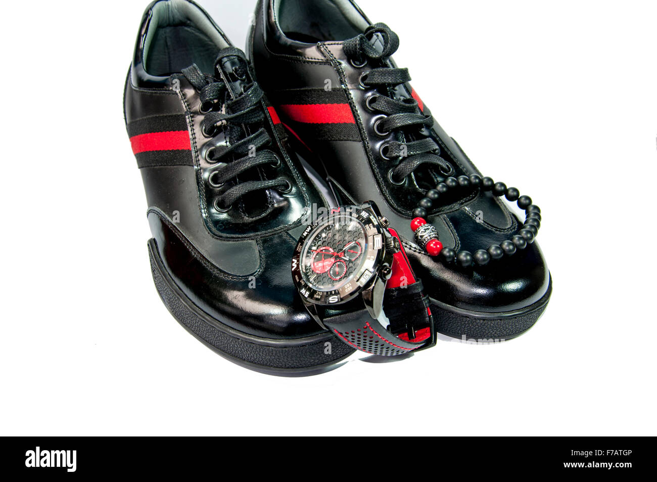Black men shoes with red stripe, watch and bracelet isolated by white ...
