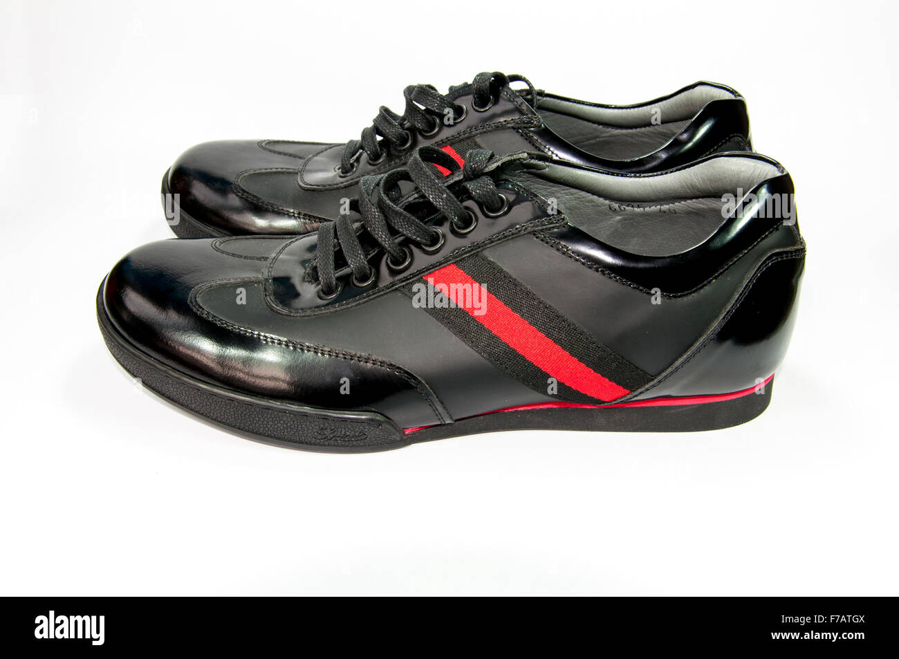 Black men shoes with red stripe isolated with white background Stock ...
