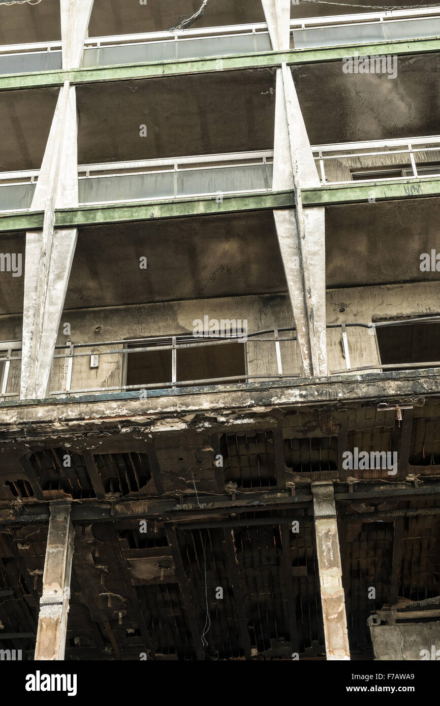 Heavy fire damage on the facade of a high rise building Stock Photo - Alamy