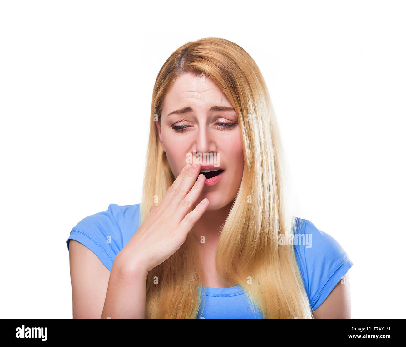 Blonde surprised and disdainfully looking down Stock Photo - Alamy