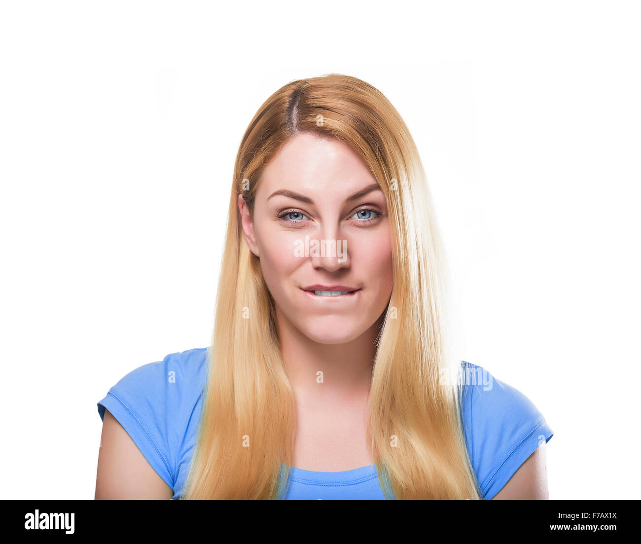 Blond woman bit her lip Stock Photo - Alamy