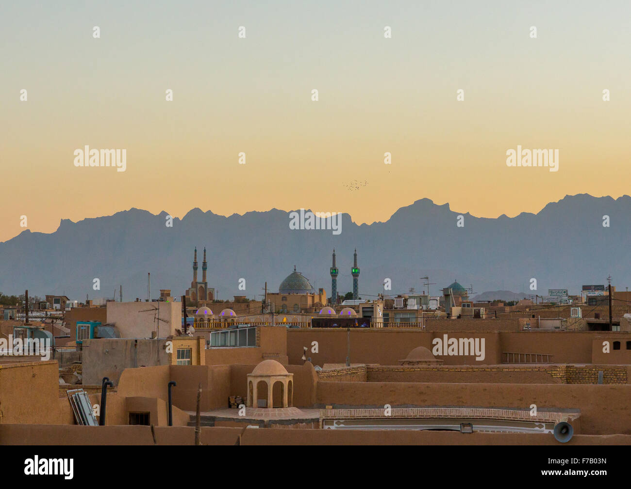 View Of The City With Traditional Wind Catchers And Mosques At Dusk ...