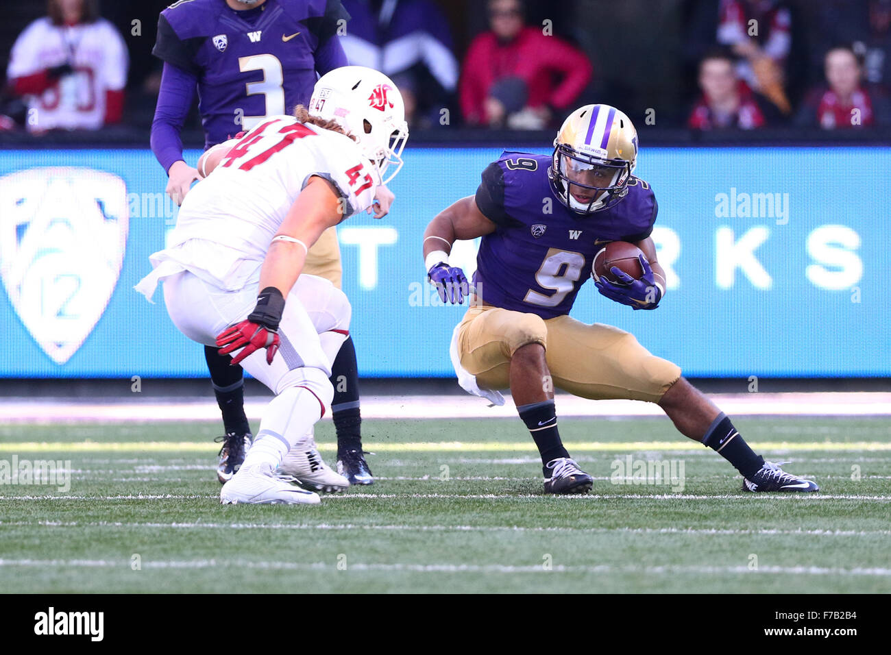 November 27, 2015: Washington's Myles Gaskin (9) makes a cut against ...