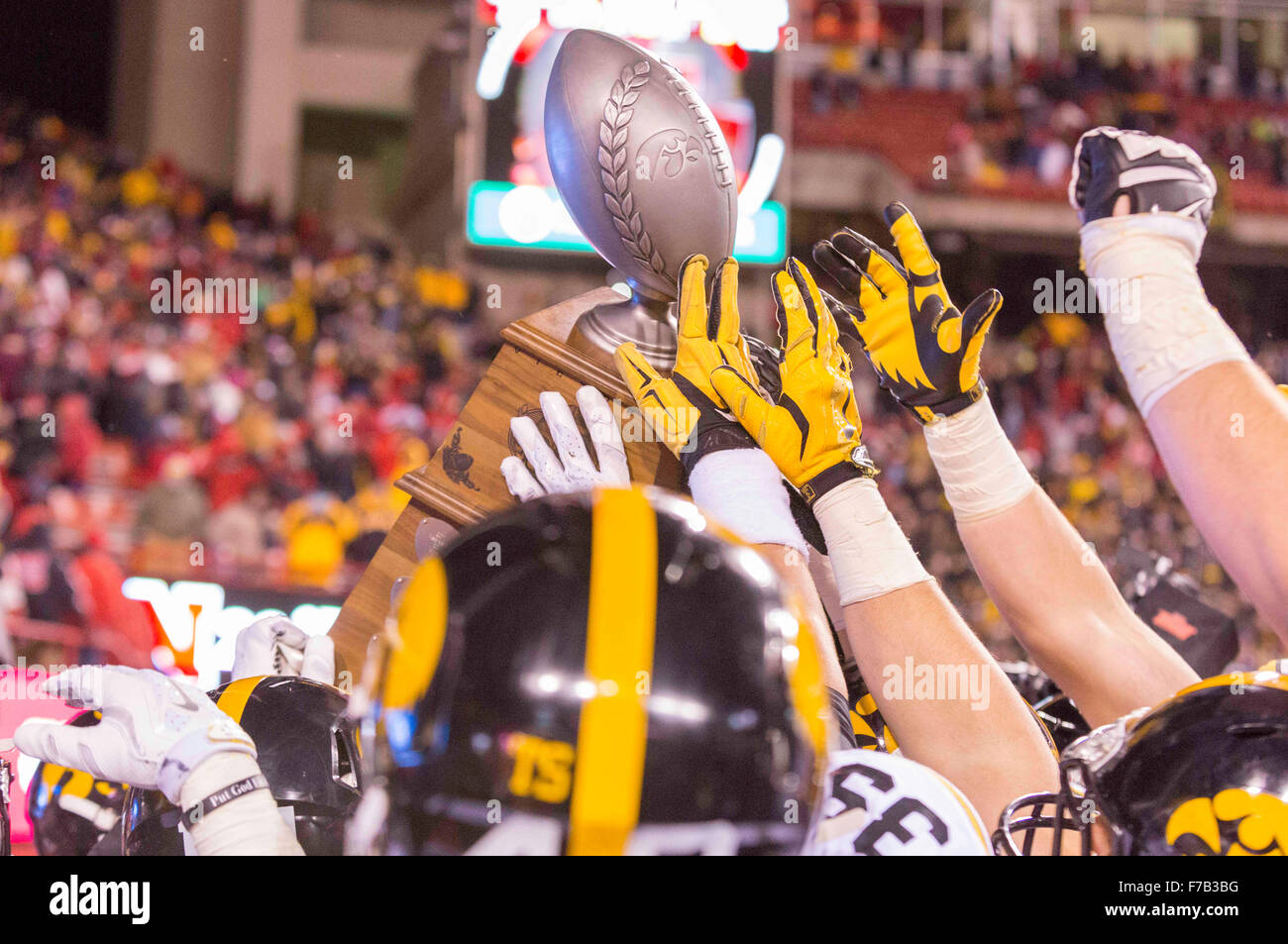 Lincoln, NE. USA. 27th Nov, 2015. Iowa Hawkeyes raise the Hy-Vee Heroes ...