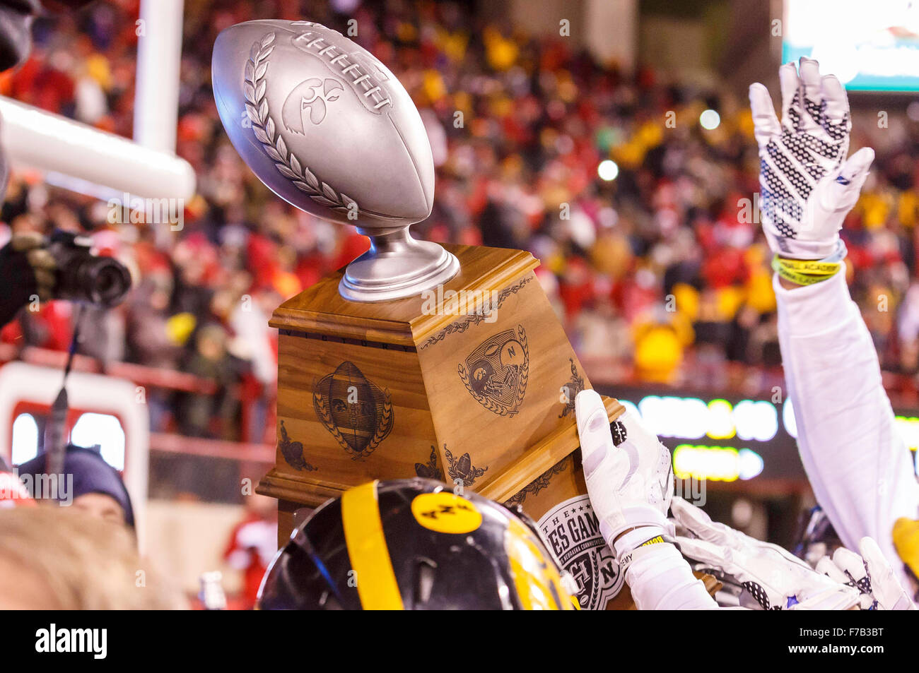 Lincoln, NE. USA. 27th Nov, 2015. Iowa Hawkeyes raise the Hy-Vee Heroes ...