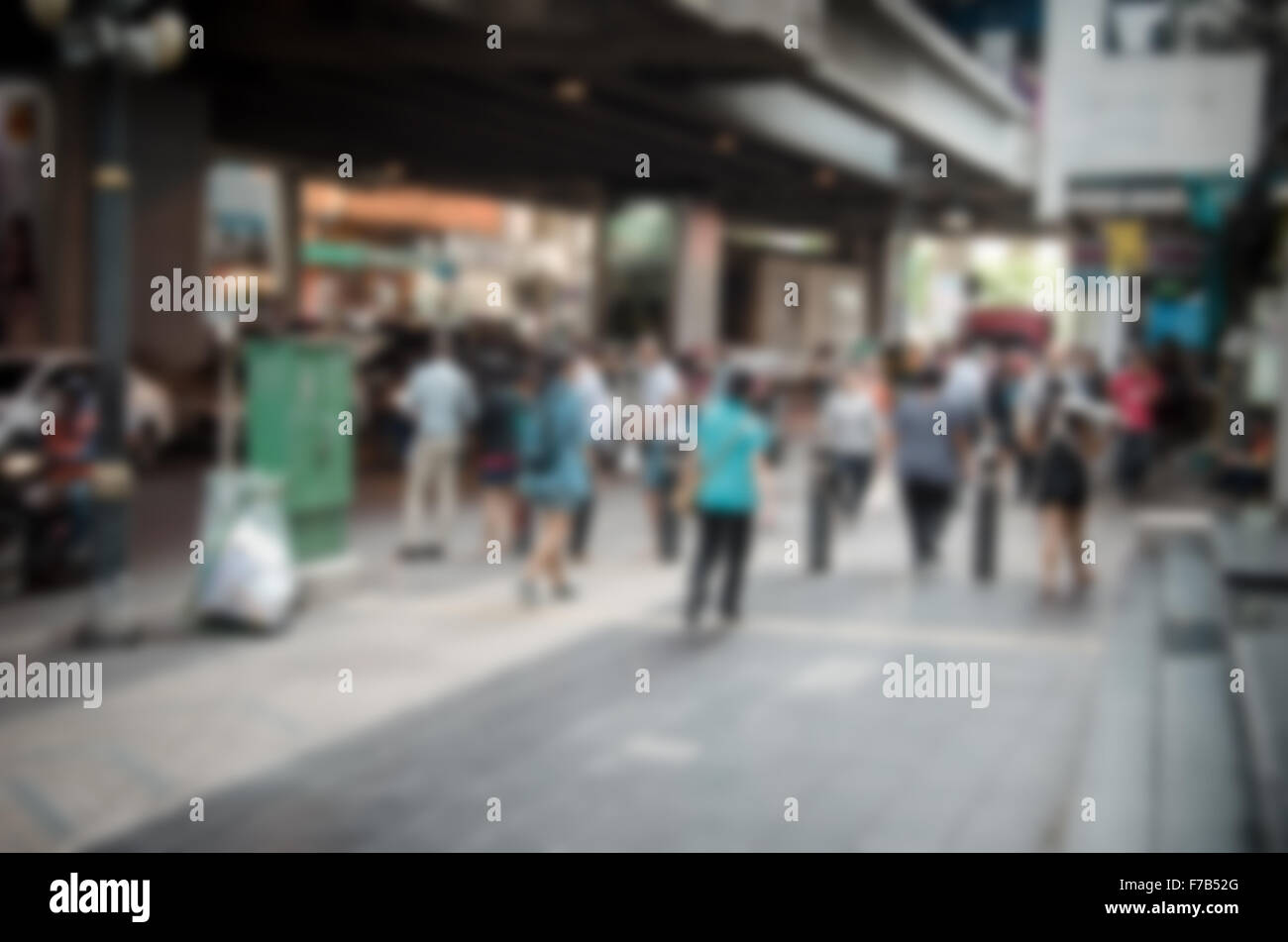 out of focus picture of a crowd of people walking in the city Stock ...