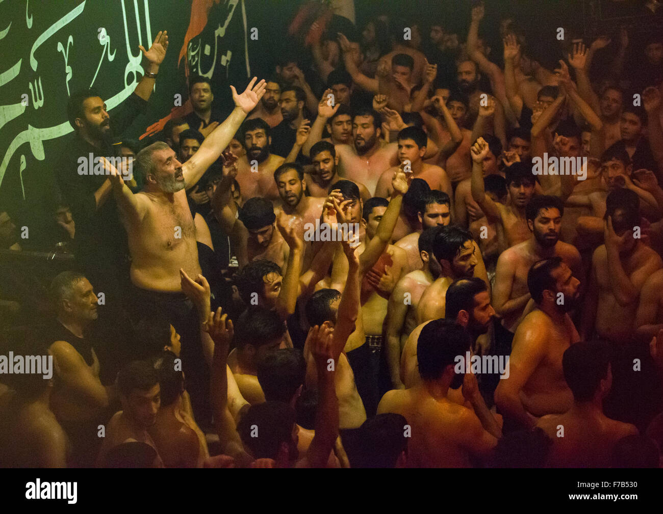 Iranian Shiite Muslim Man Leading Recitations And Songs With The Mad Of ...