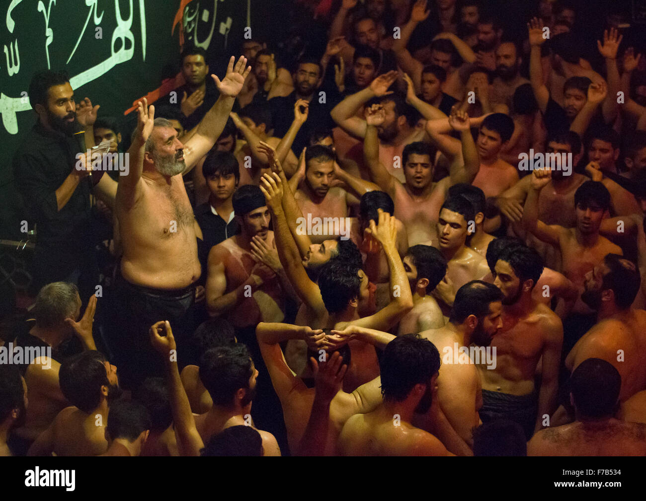 Iranian Shiite Muslim Man Leading Recitations And Songs With The Mad Of ...
