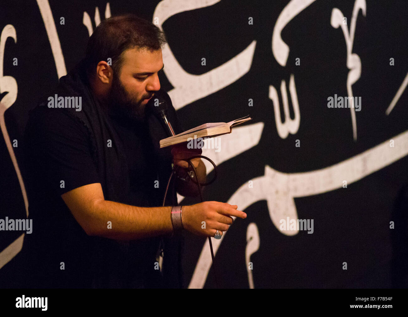 Iranian Shiite Muslim Man Leading Recitations And Songs With The Mad Of ...