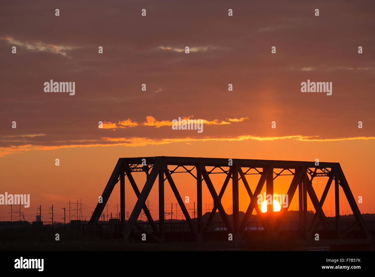 Grand Trunk Bridge at sunset, a steel trestle railway bridge built as ...
