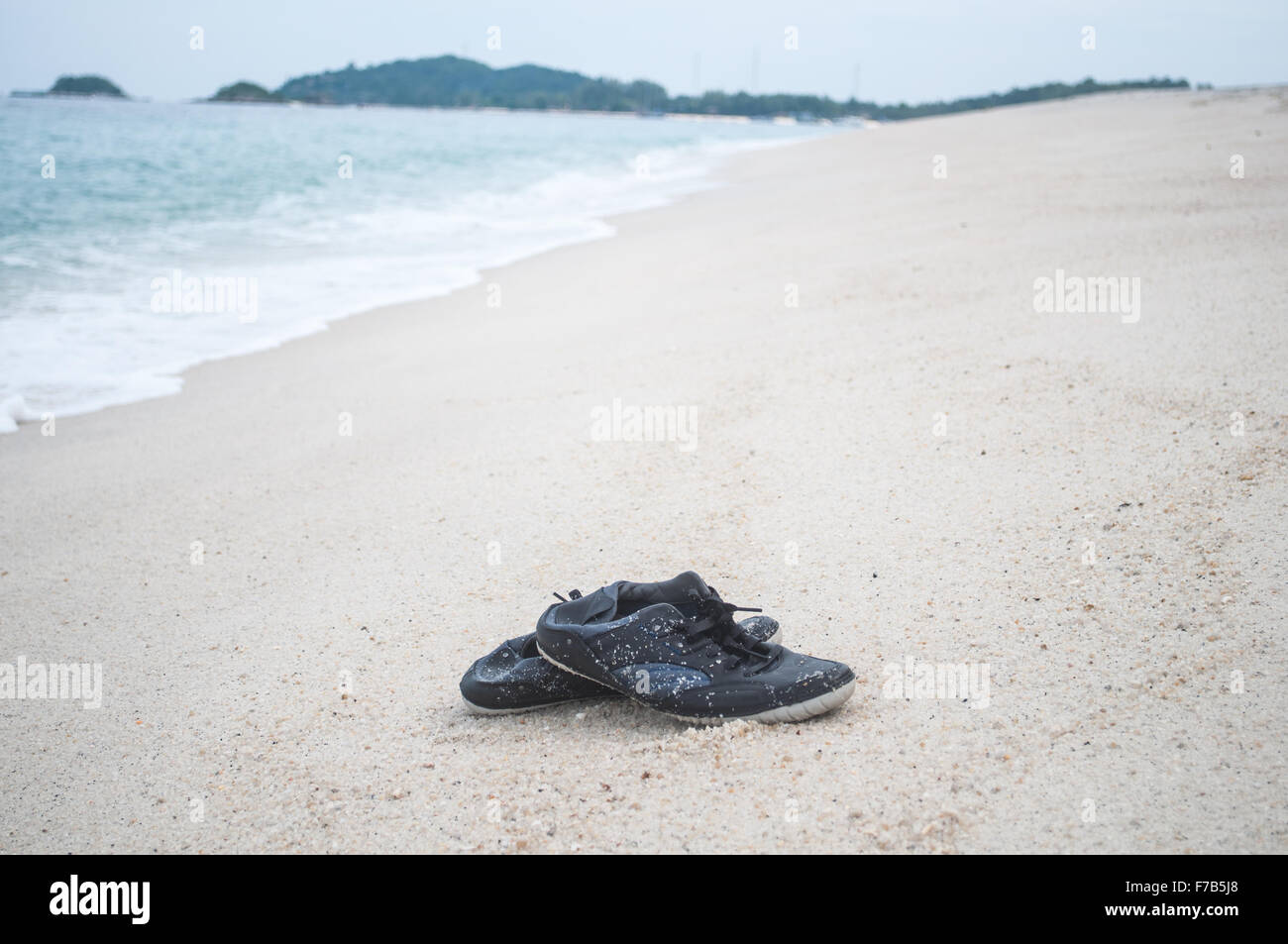 shoes on the beach Stock Photo - Alamy