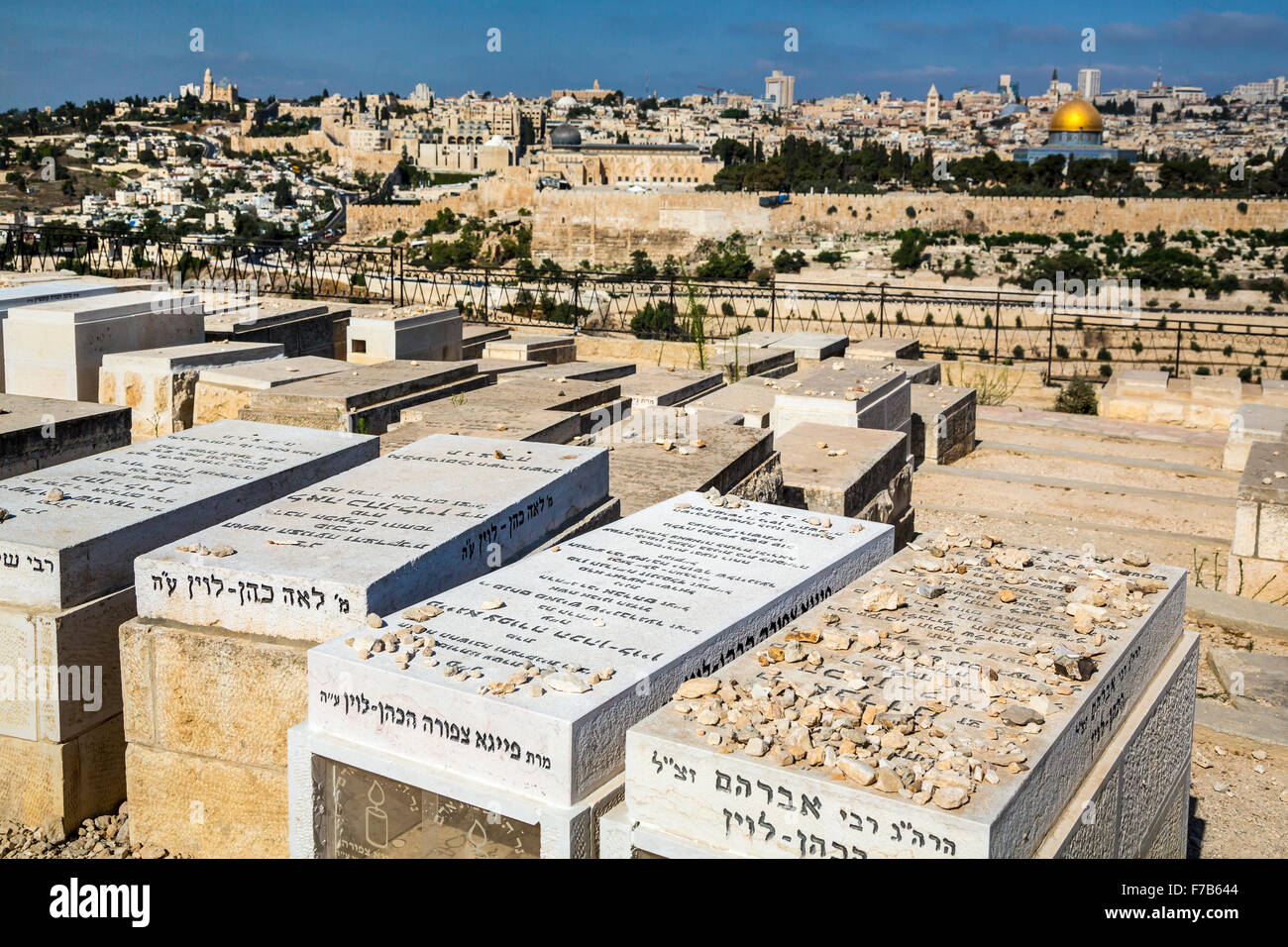 A view of the Jewish cemetery and the old walled city of Jerusalem ...