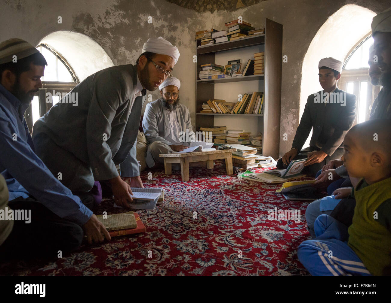 An Imam Teaching The Koran To Shiite Muslim Students In A Coranic ...