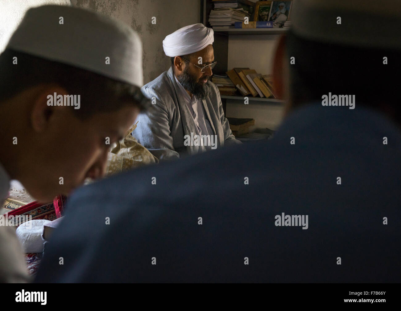 An Imam Teaching The Koran To Shiite Muslim Students In A Coranic ...