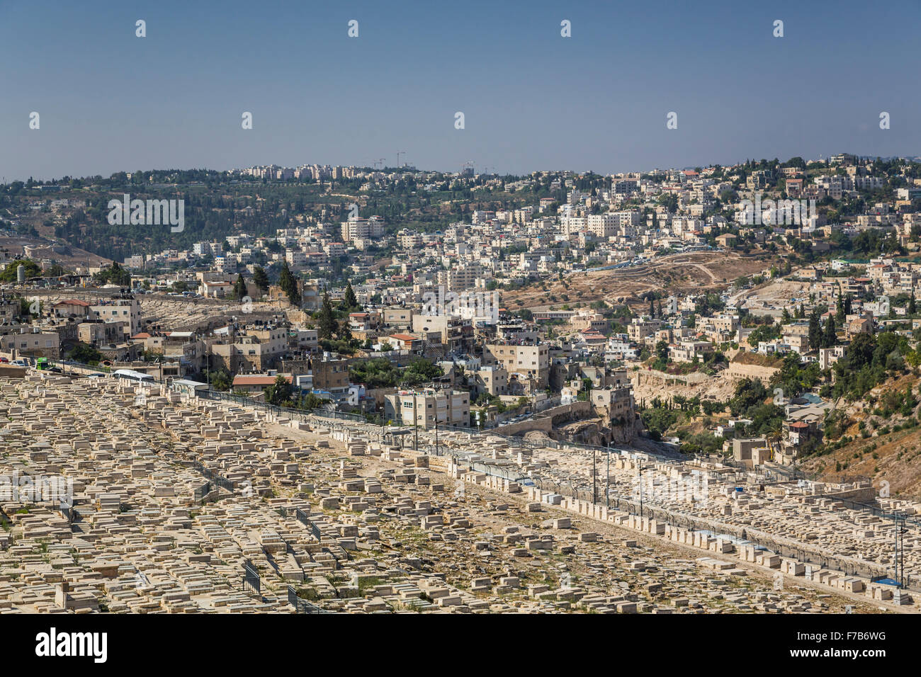 A view of the Jewish cemetery and the old walled city of Jerusalem ...