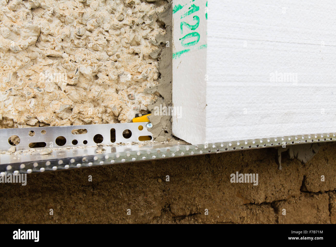 closeup of insulation facade polystyrene - foundation rail Stock Photo ...